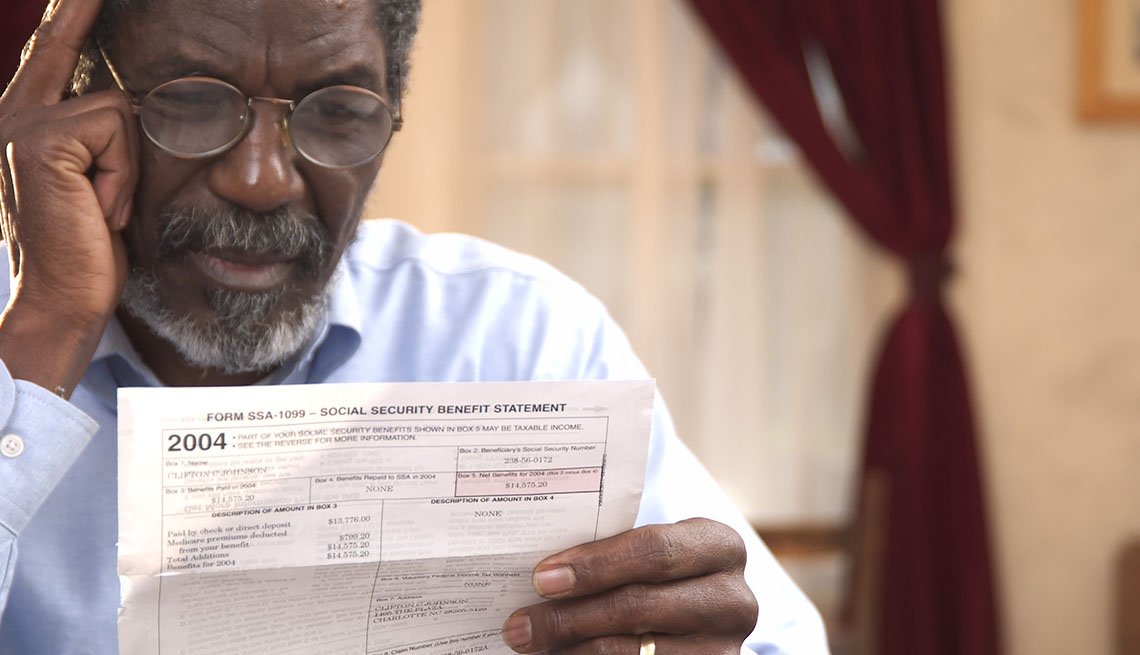 Man looking at SSI form