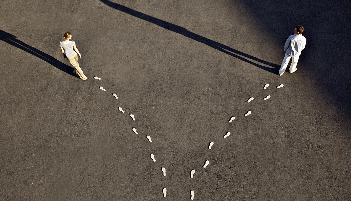 Two People Walking Away From Each Other